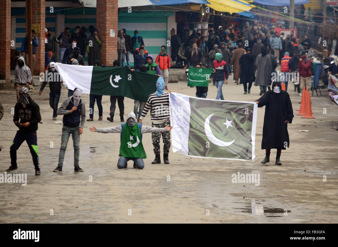 Kashmiri Muslim protesters display flags during pro-freedom ...