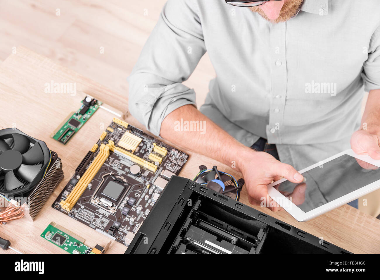 Computer repair professional Stock Photo - Alamy