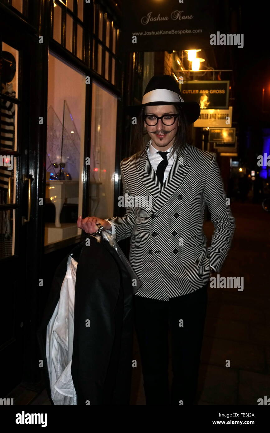 London,England,UK, 8th Jan 2016 : Joshua Kane return to his shop after ...