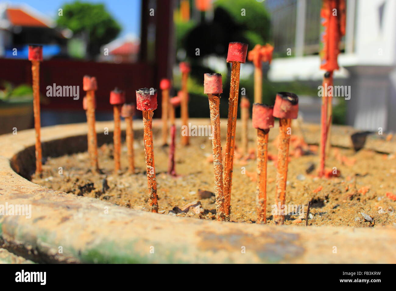 background of extinguish big incense sticks in joss stick pot Stock ...