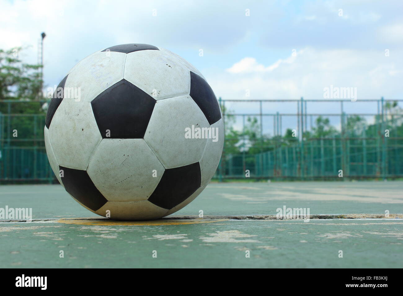 ball on the outdoor futsal court during the daytime Stock Photo - Alamy