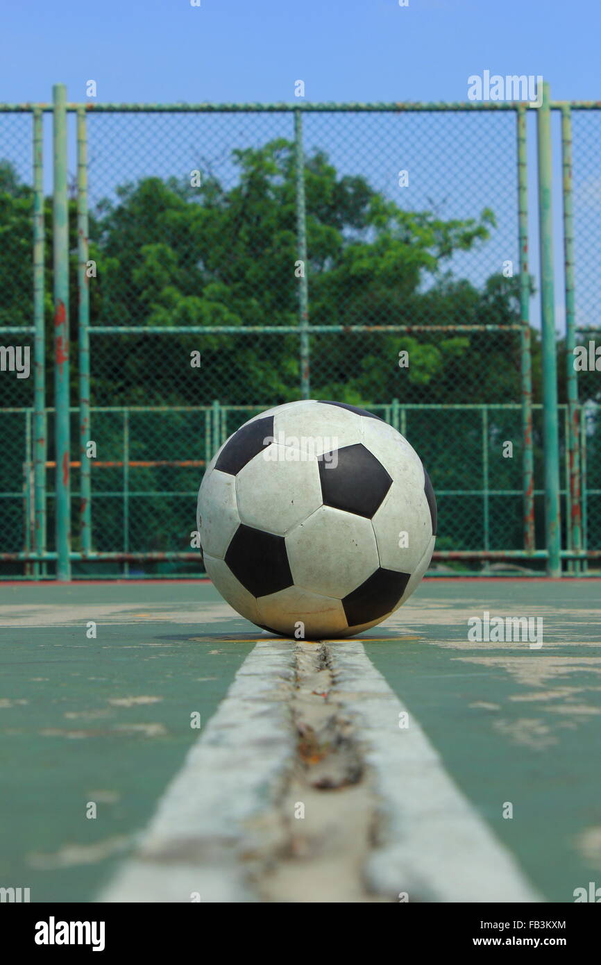 Ball on outdoor futsal court hi-res stock photography and images - Alamy