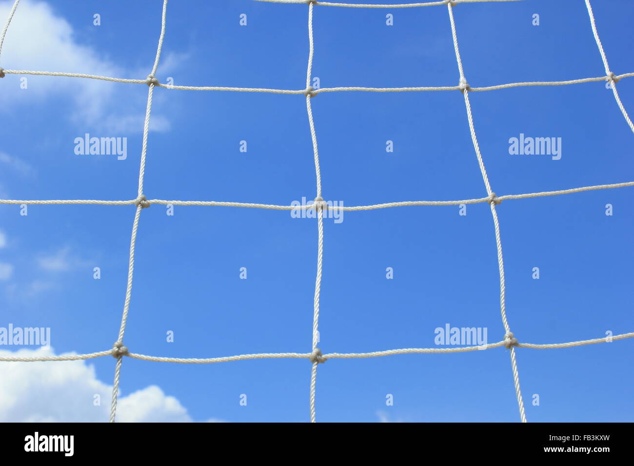 net on the blue sky background during the daytime Stock Photo - Alamy