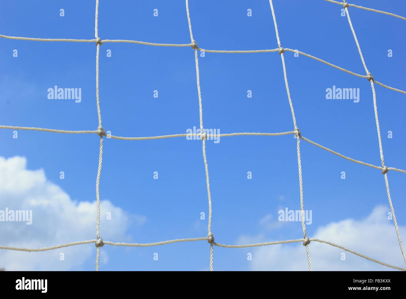 net on the blue sky background during the daytime Stock Photo - Alamy