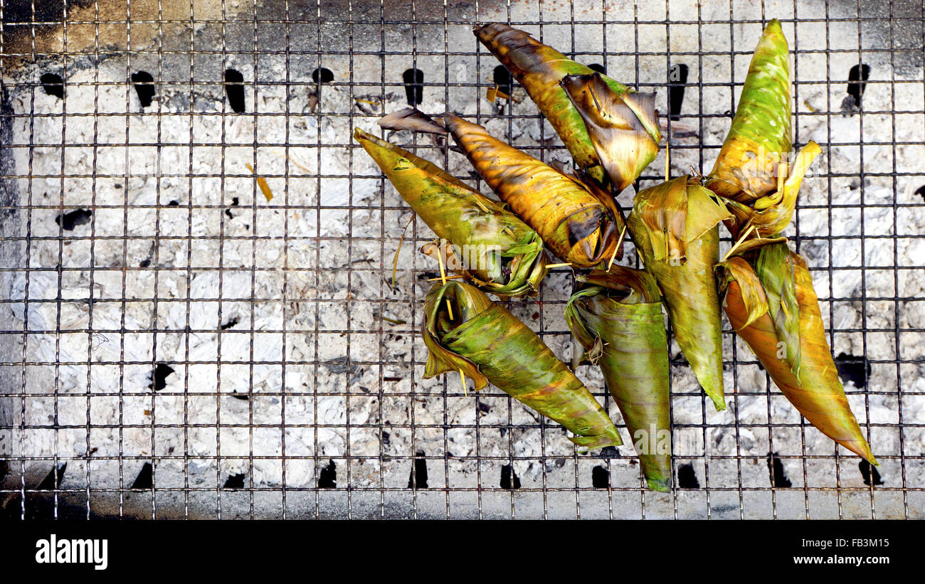 Black sticky Rice with coconut milk and taro at Fresh market in Luang ...