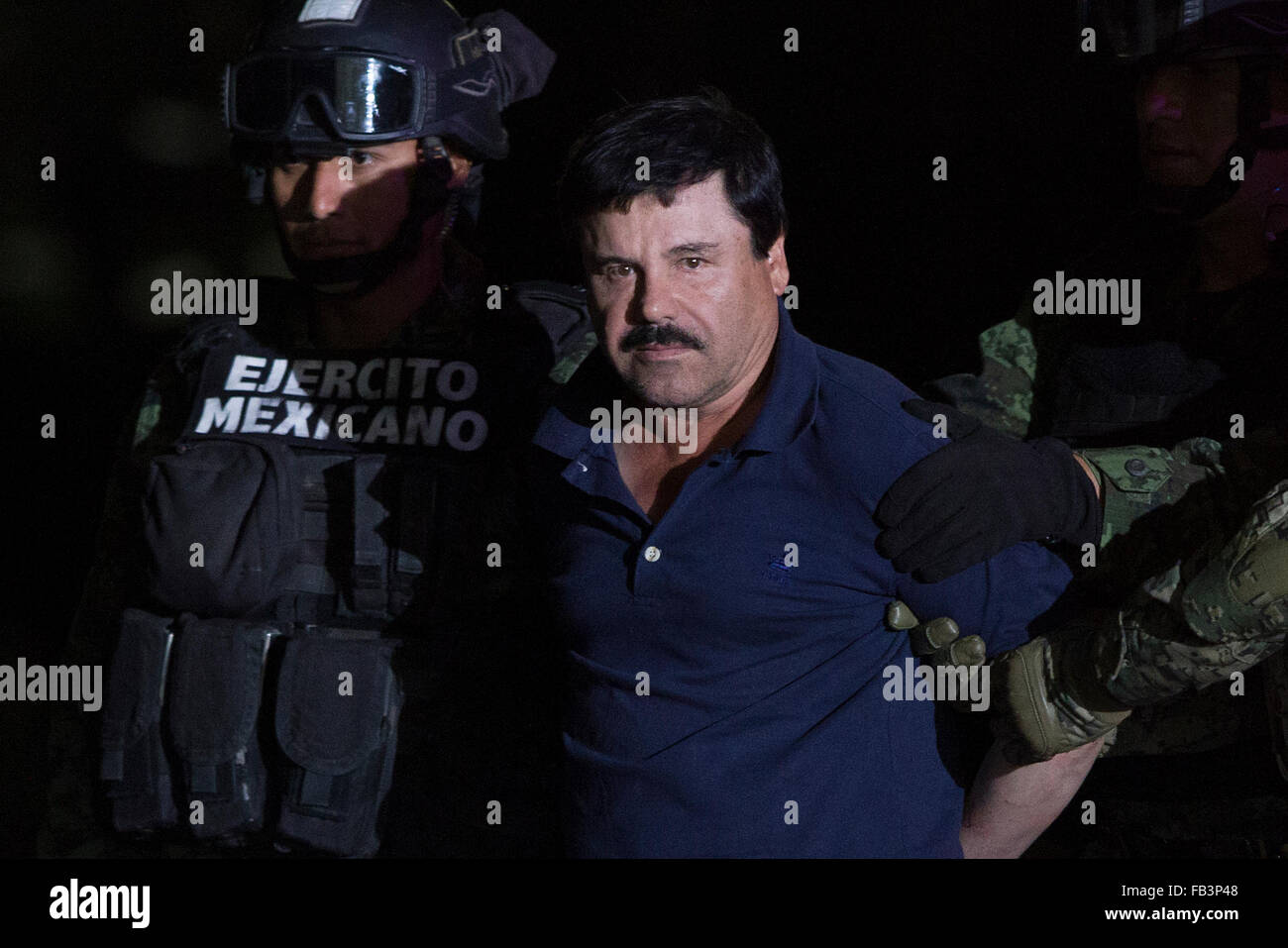 Mexico City, Mexico. 8th Jan, 2016. Soldiers escort Joaquin Guzman ...