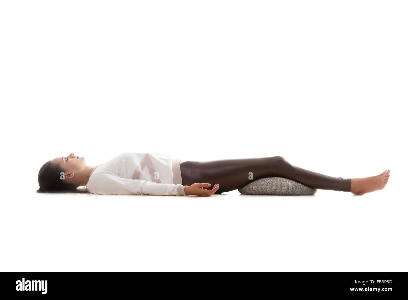 Corpse pose girl Cut Out Stock Images & Pictures - Alamy