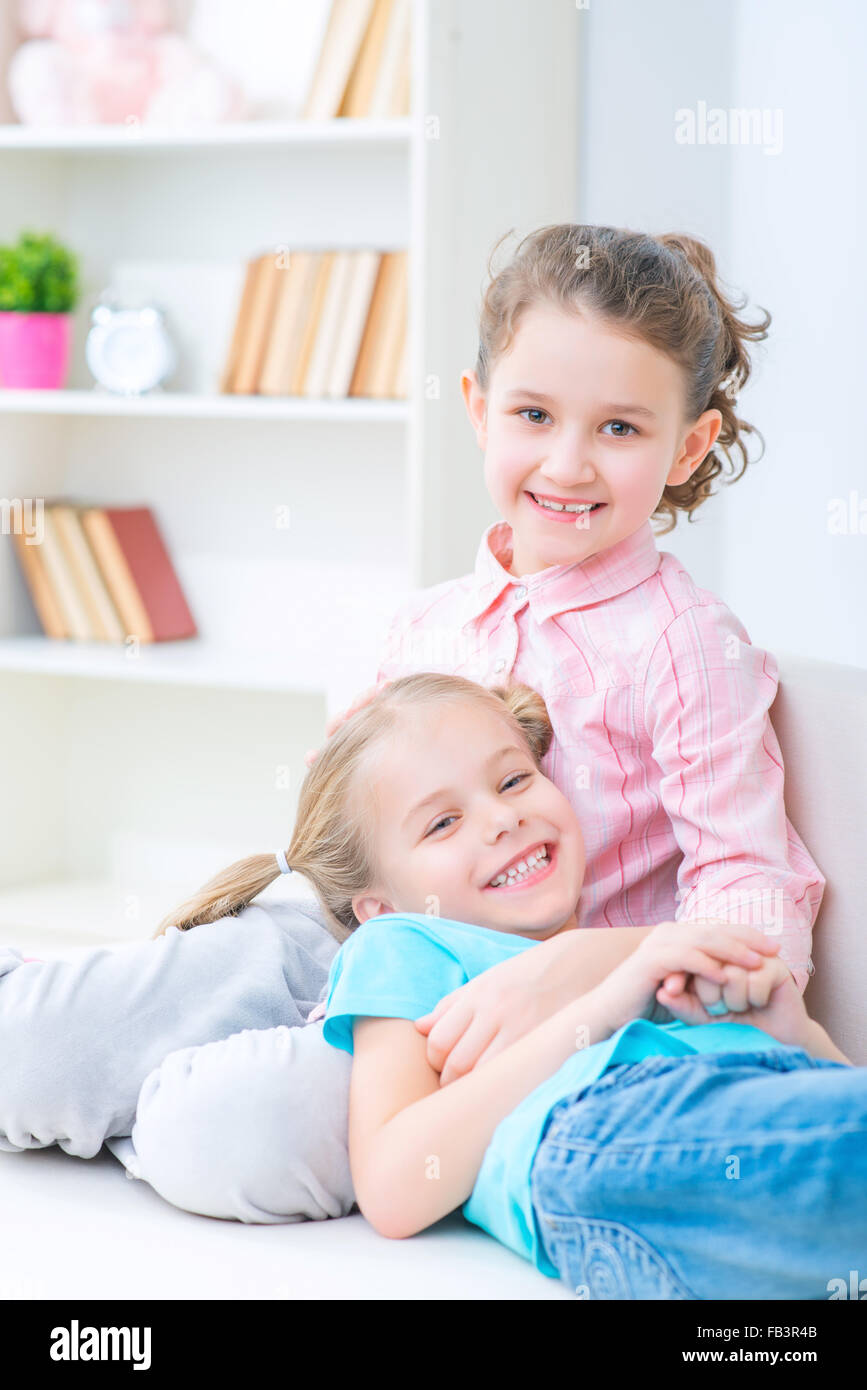 Happy sisters having fun together Stock Photo - Alamy