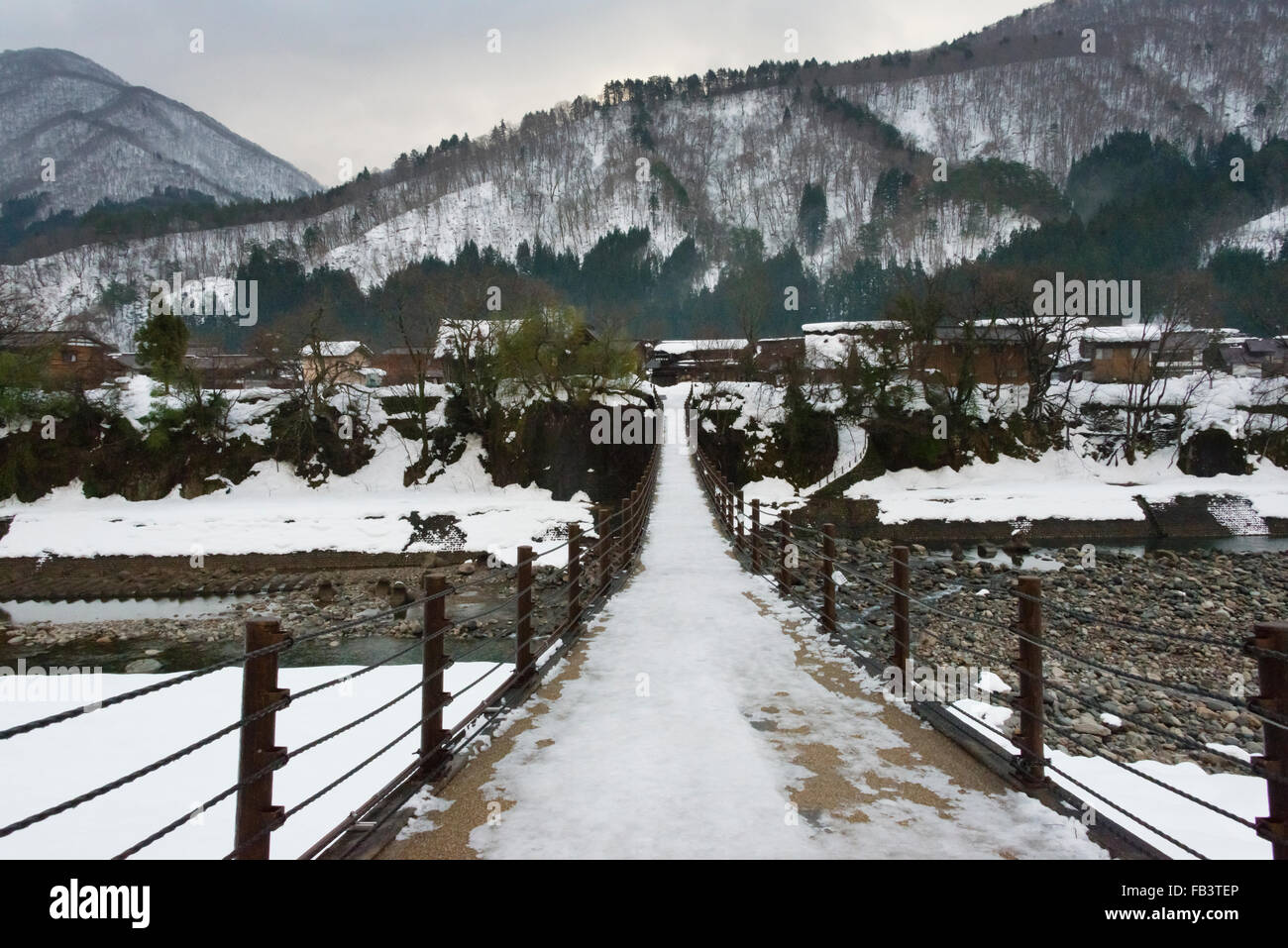 Bridge leading to the village in the mountain, Shirakawa-go, Gifu ...