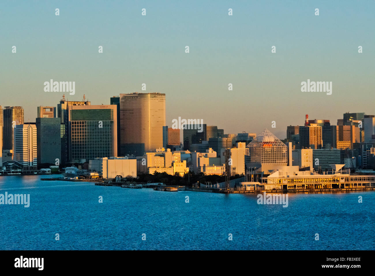 High rises along the waterfront in Tokyo Harbor at dawn, Tokyo, Japan ...