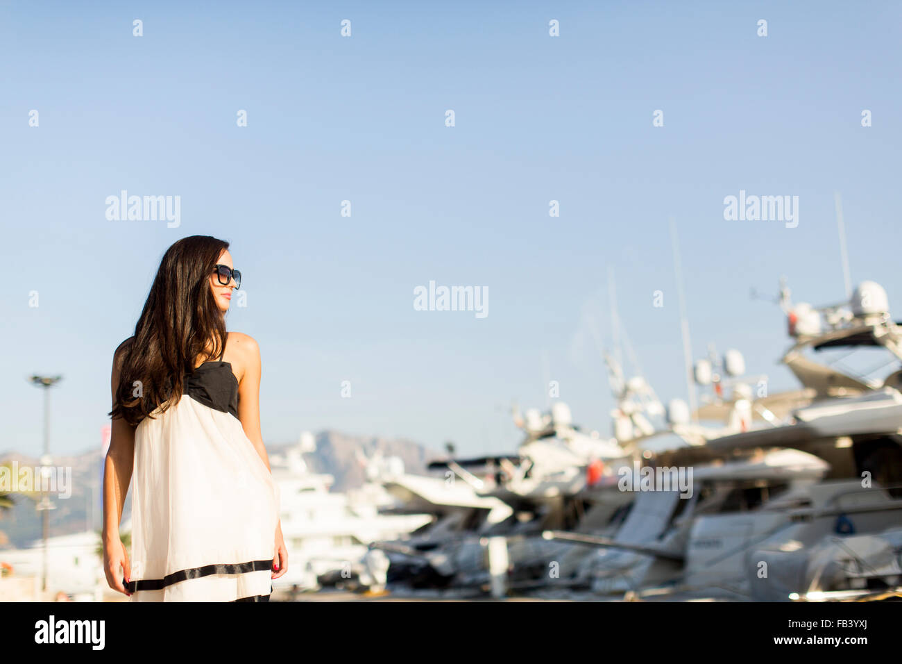 Young woman by marina hi-res stock photography and images - Alamy
