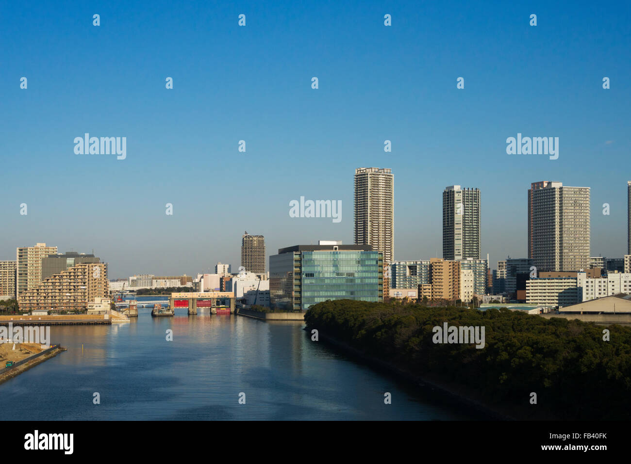 High rises along the waterfront in Tokyo Harbor at dawn, Tokyo, Japan ...