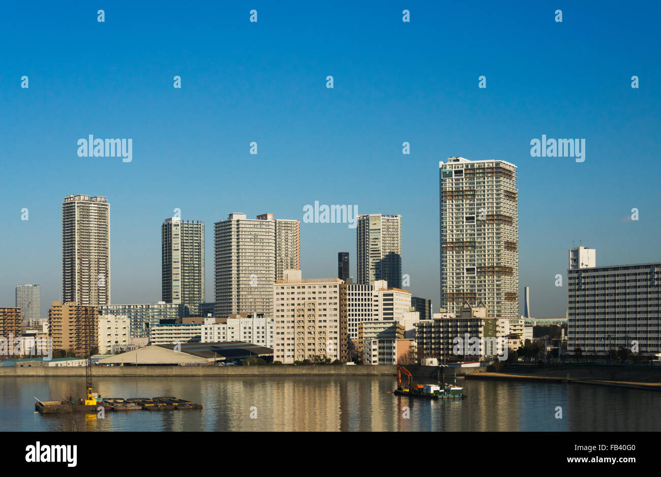 High rises along the waterfront in Tokyo Harbor at dawn, Tokyo, Japan ...