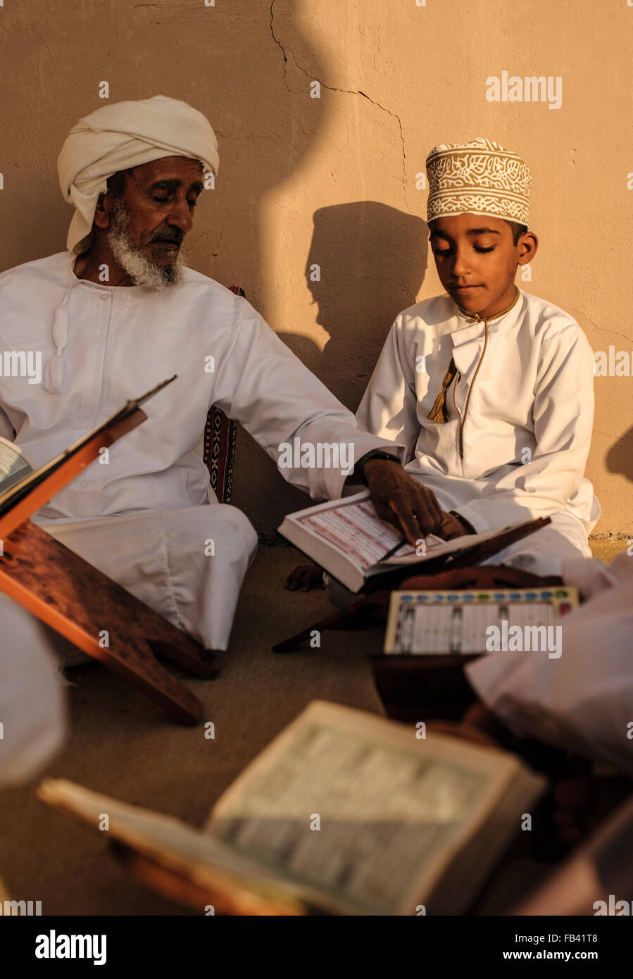 Scholar reading quran hi-res stock photography and images - Alamy