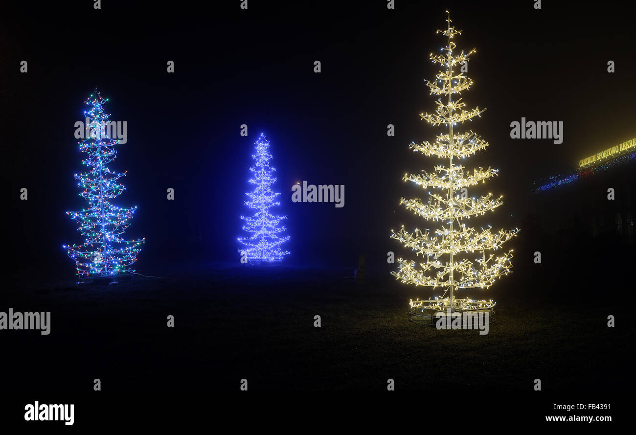 Christmas Tree with Multi Colored Lights at Night Stock Photo - Alamy