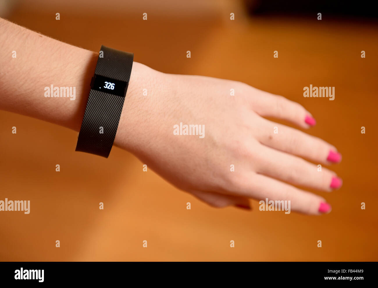 FitBit, wearable fitness tracker Stock Photo - Alamy
