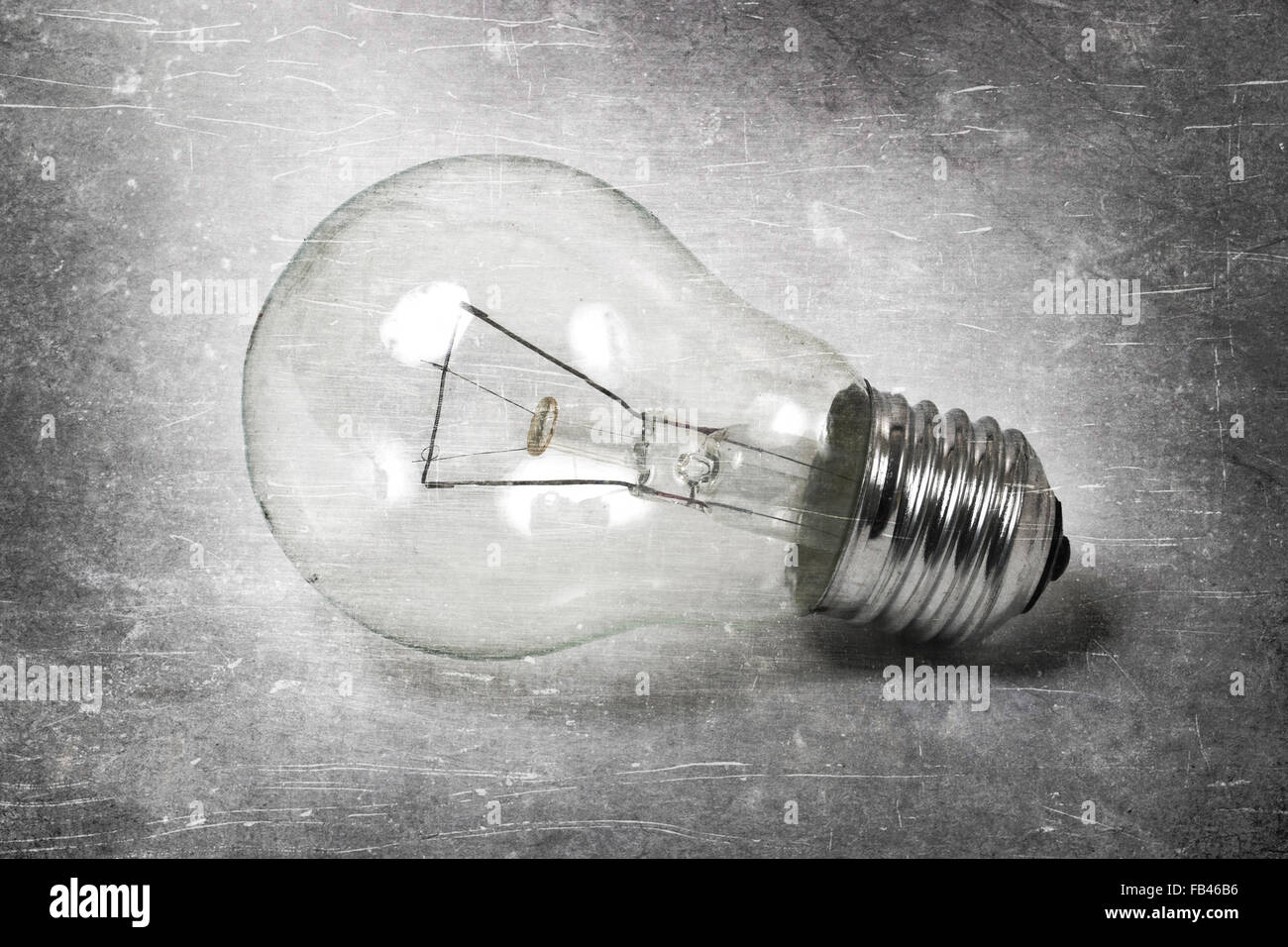 Old lightbulb isolated on a white background - Vintage look Stock Photo ...