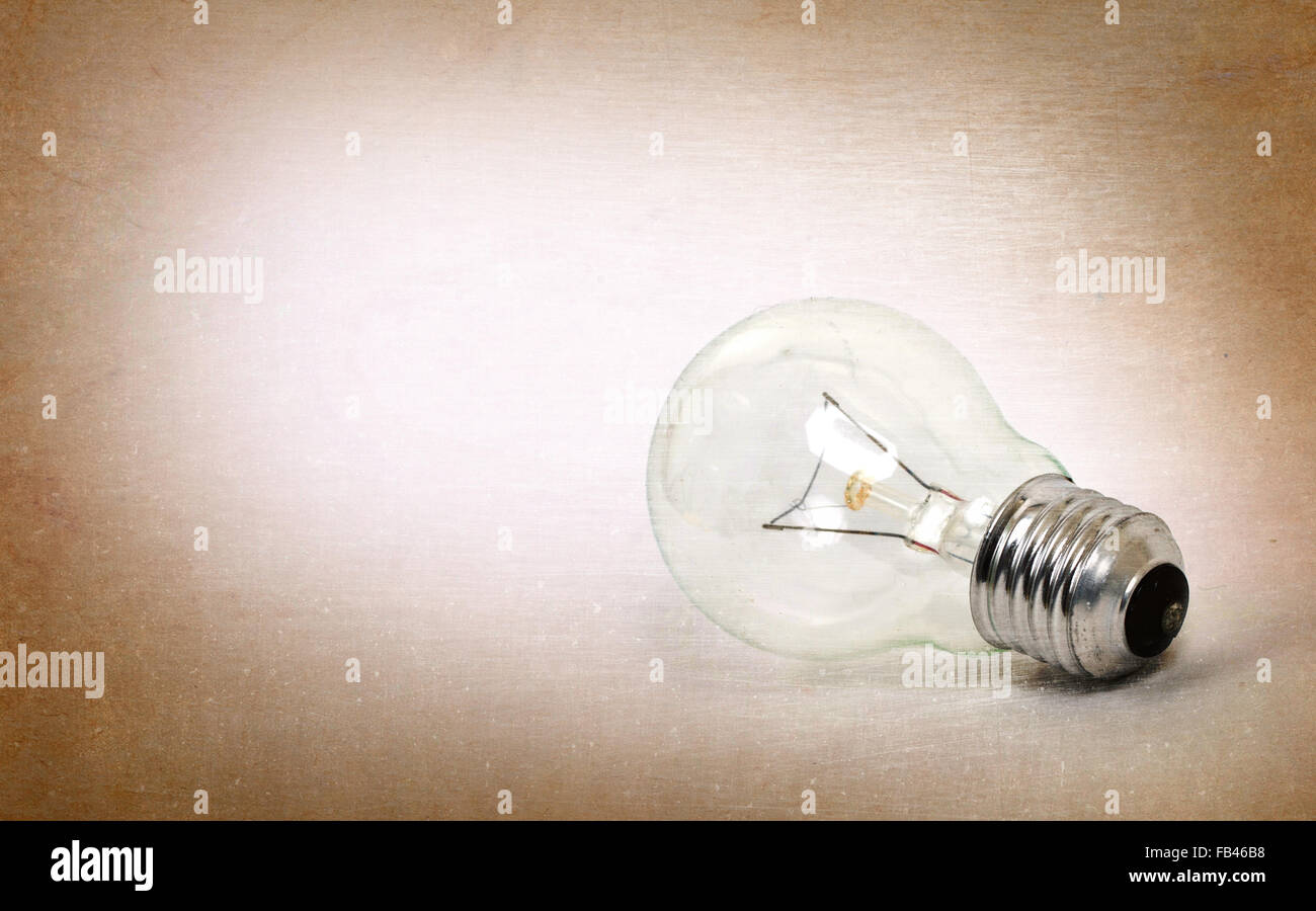 Old lightbulb isolated on a white background - Vintage look Stock Photo ...