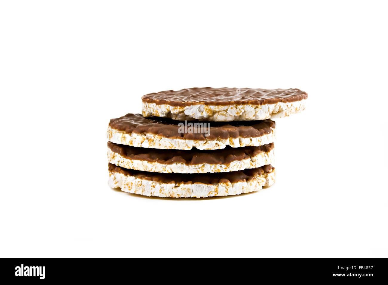 Stack of chocolate coated rice cakes, white background Stock Photo - Alamy