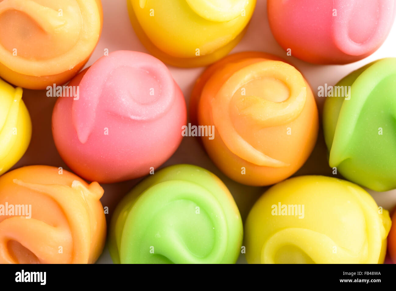 Colorful Fondant Candies On White Background Stock Photo - Alamy