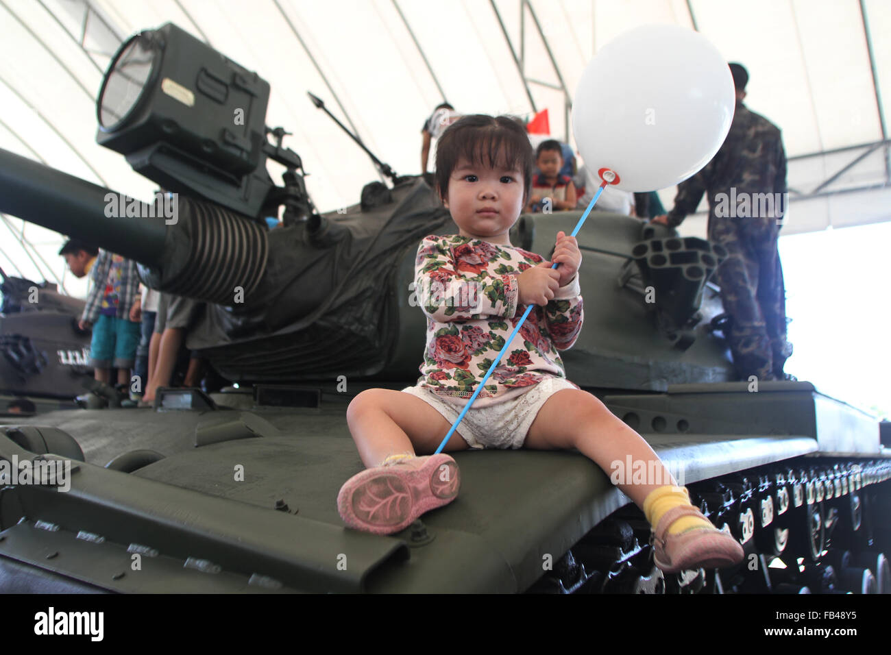 Children on top of a tank hi-res stock photography and images - Alamy