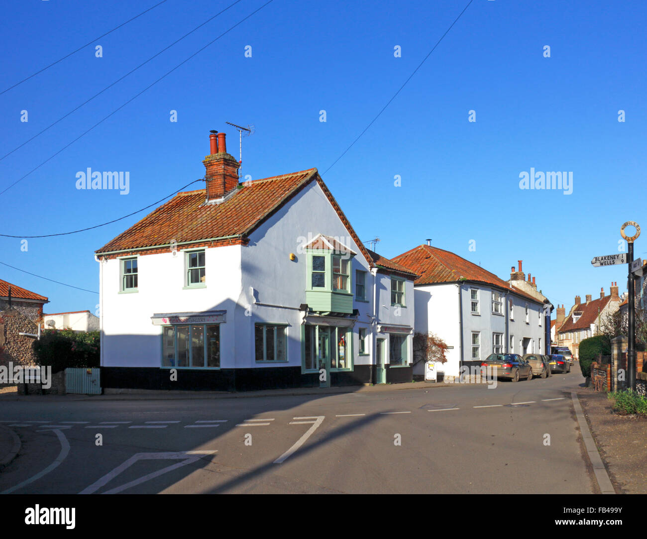 A view of the A149 coast road running through the North Norfolk village ...