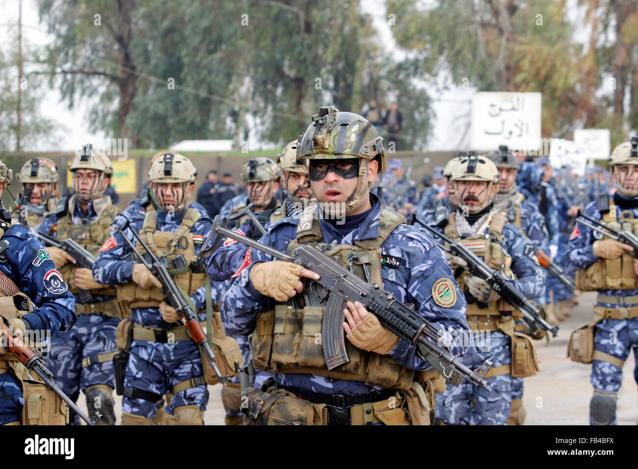 Kirkuk, Iraq. 9th Jan, 2016. Members of Iraqi police forces attend a ...