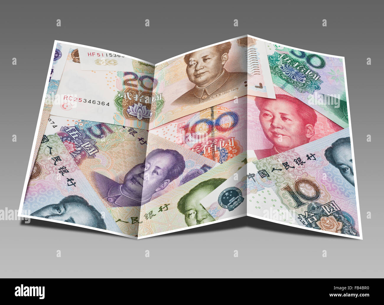 Many Yuan bills with the portrait of Mao Zedong lying side by side. The ...