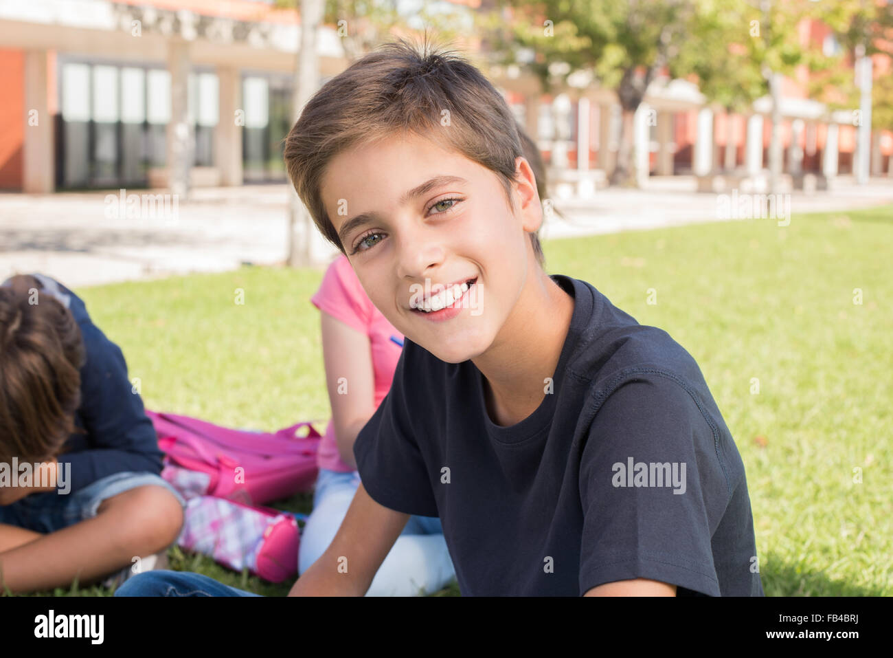 Portrait of a little boy in school campus Stock Photo - Alamy