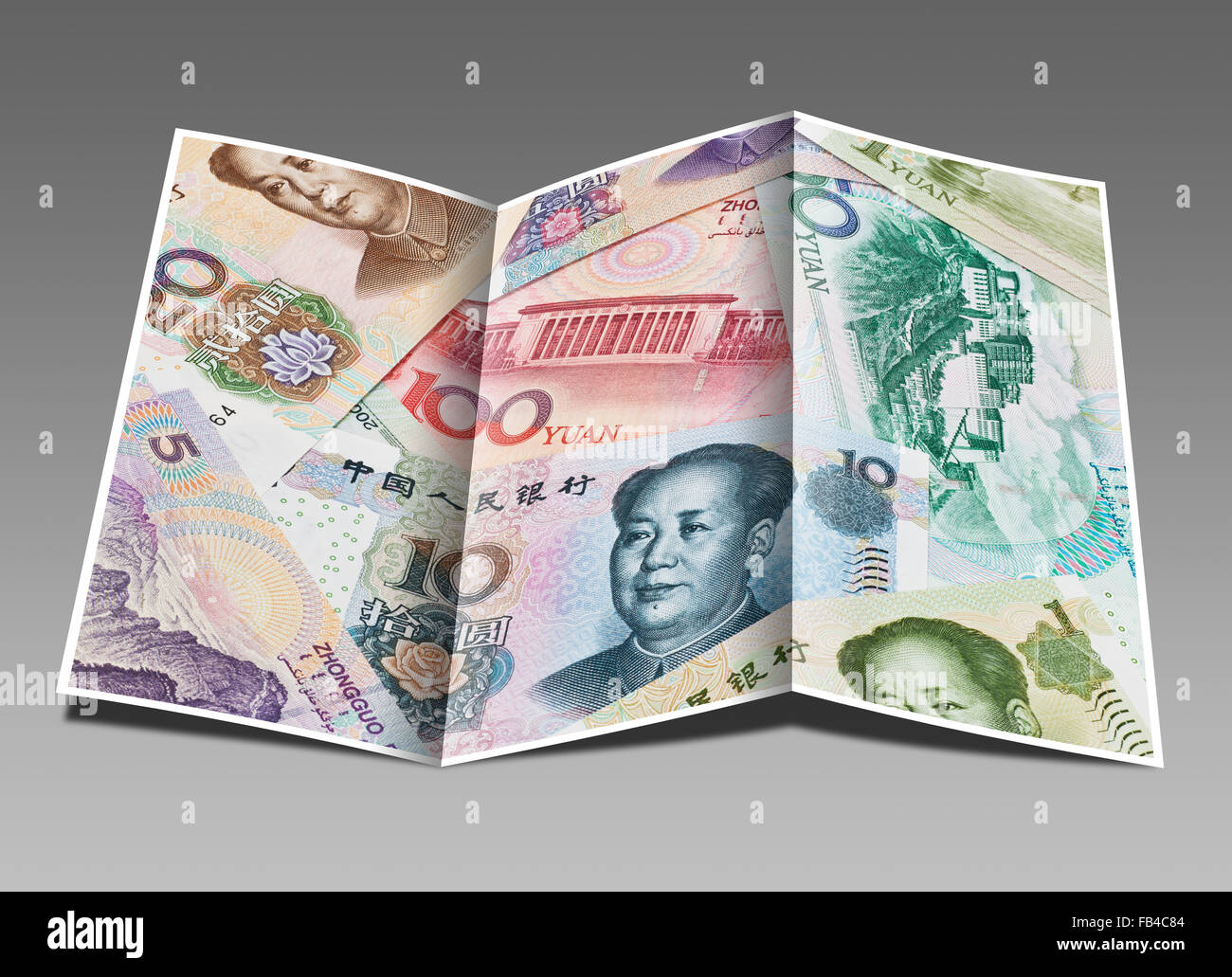 Many Yuan bills with the portrait of Mao Zedong lying side by side. The ...