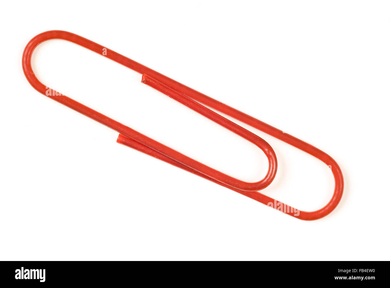 Red Paper Clip on a white background Stock Photo - Alamy