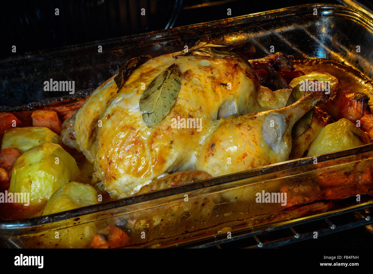 Full chicken cooking hi-res stock photography and images - Alamy
