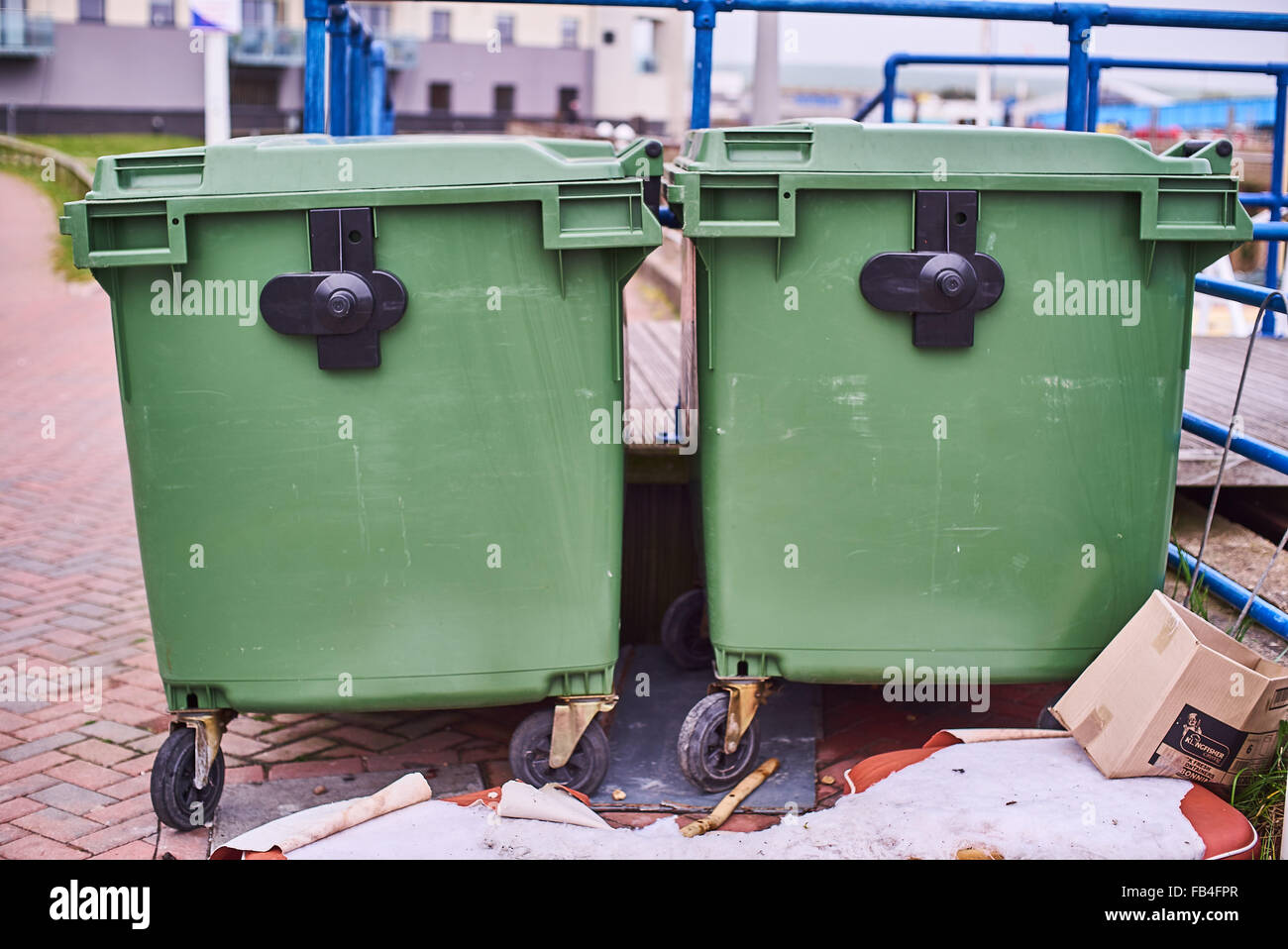 Two green wheelie bins Stock Photo - Alamy