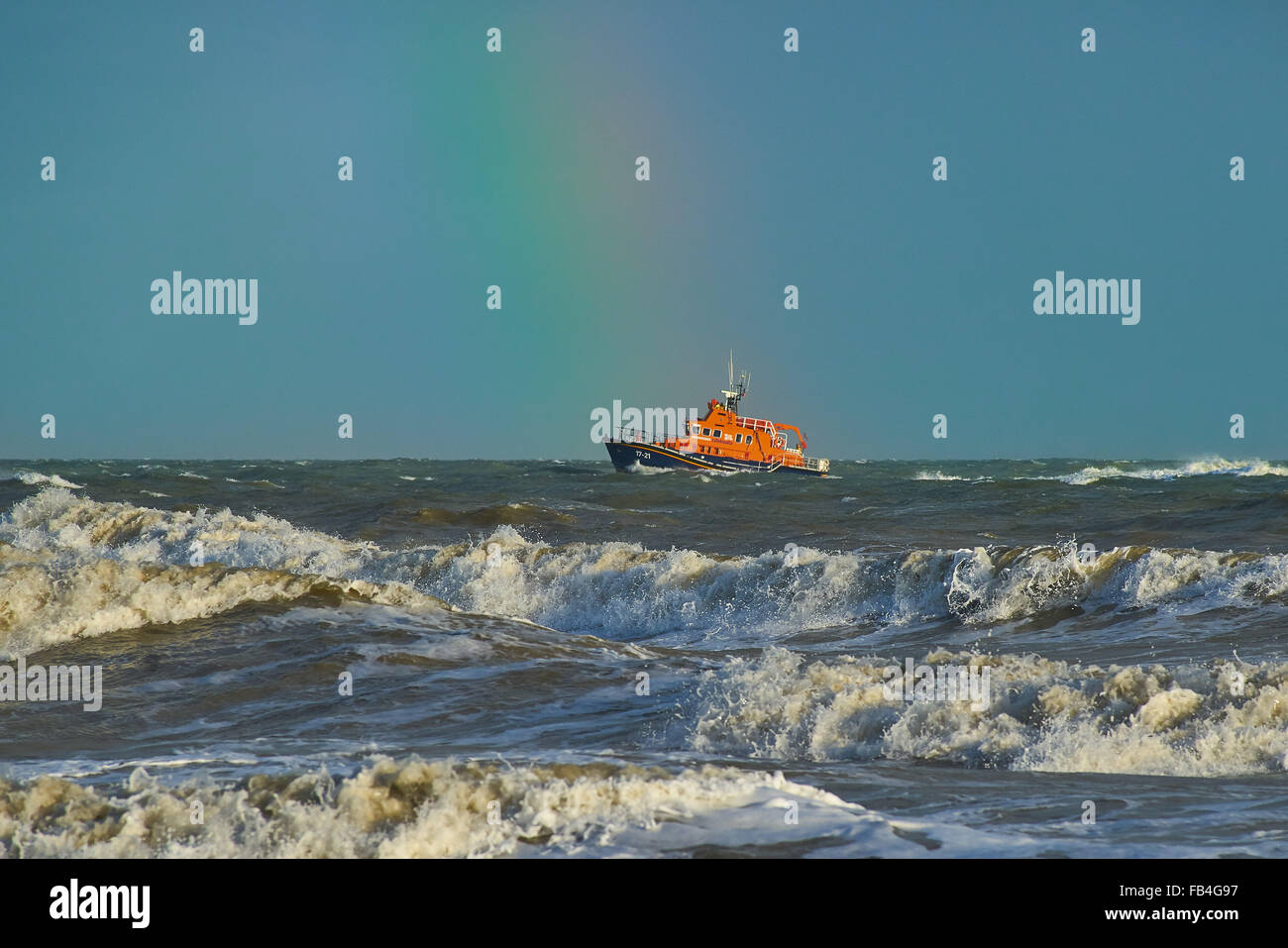 Lifeboat at Sea under a rainbow Stock Photo - Alamy