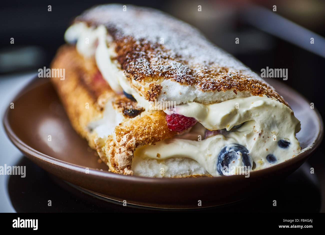 Raspberry Roulade with Cream Stock Photo - Alamy