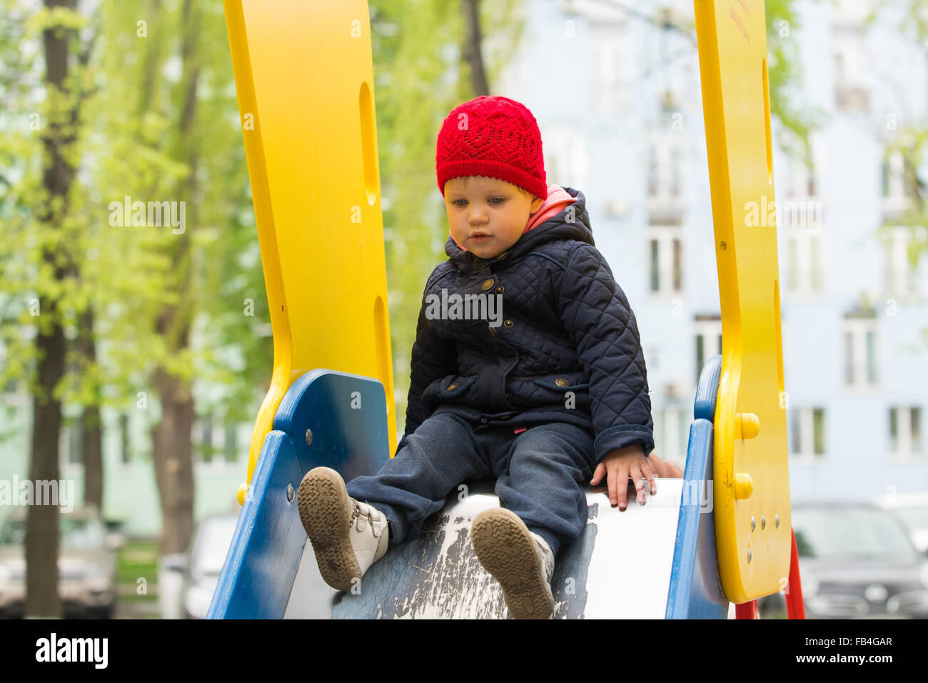 girl playing in a spring park in a playground Stock Photo - Alamy