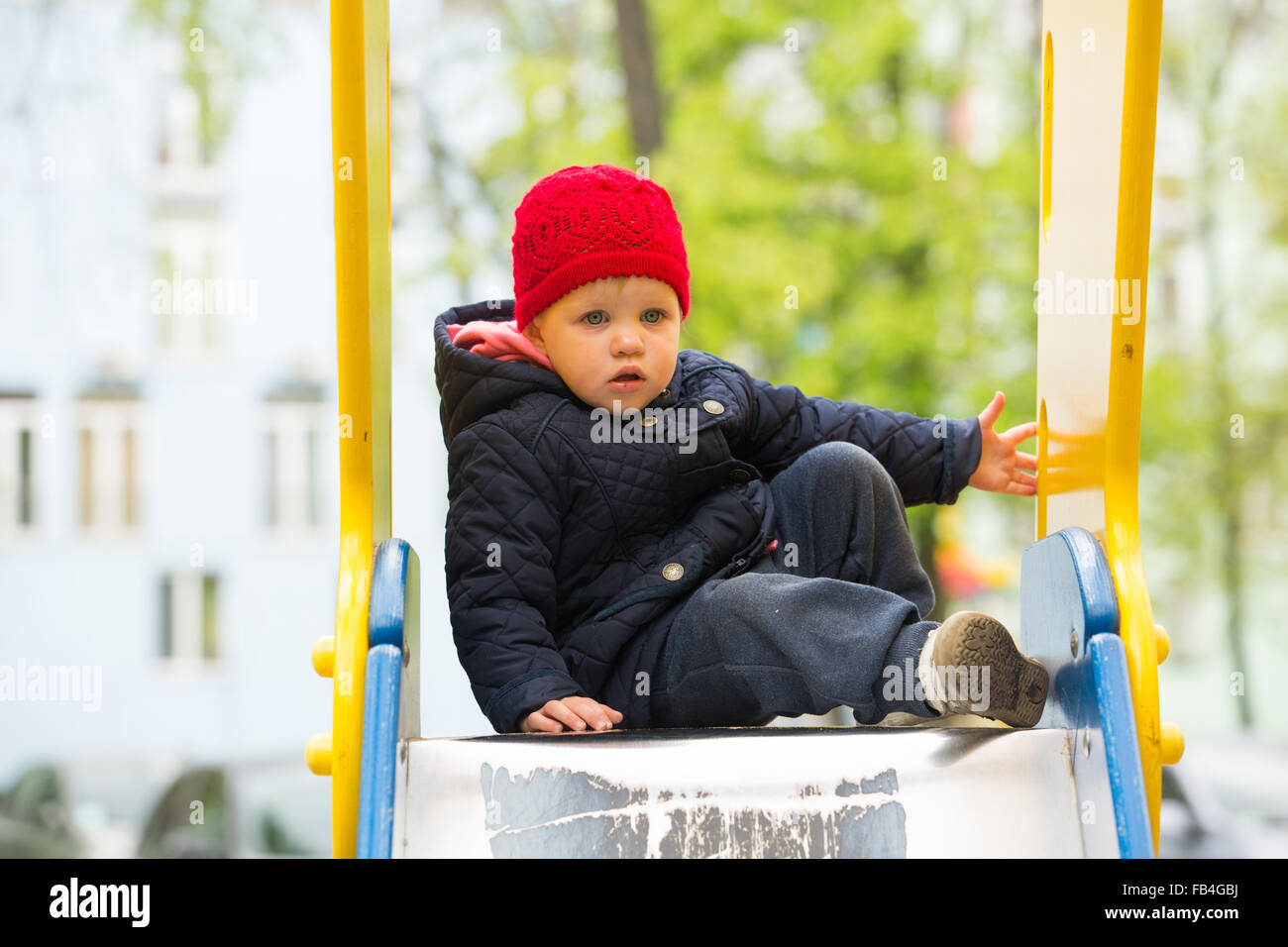 girl playing in a spring park in a playground Stock Photo - Alamy