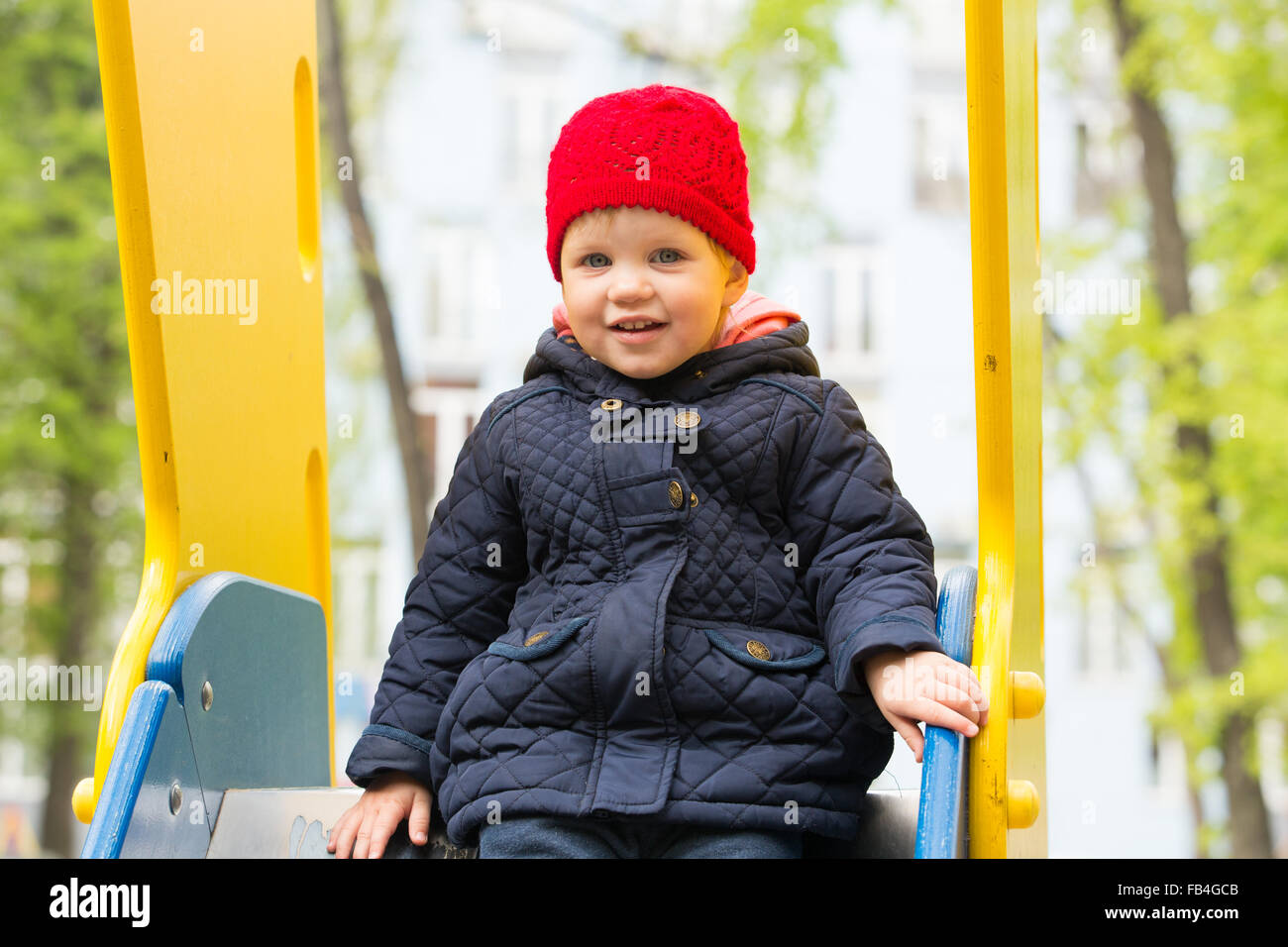 girl playing in a spring park in a playground Stock Photo - Alamy