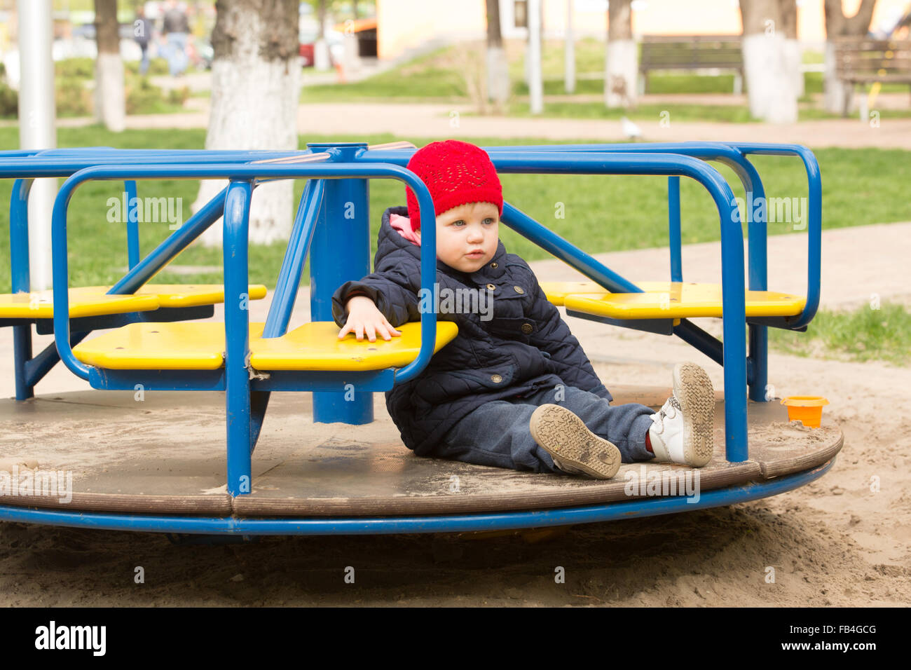 girl playing in a spring park in a playground Stock Photo - Alamy