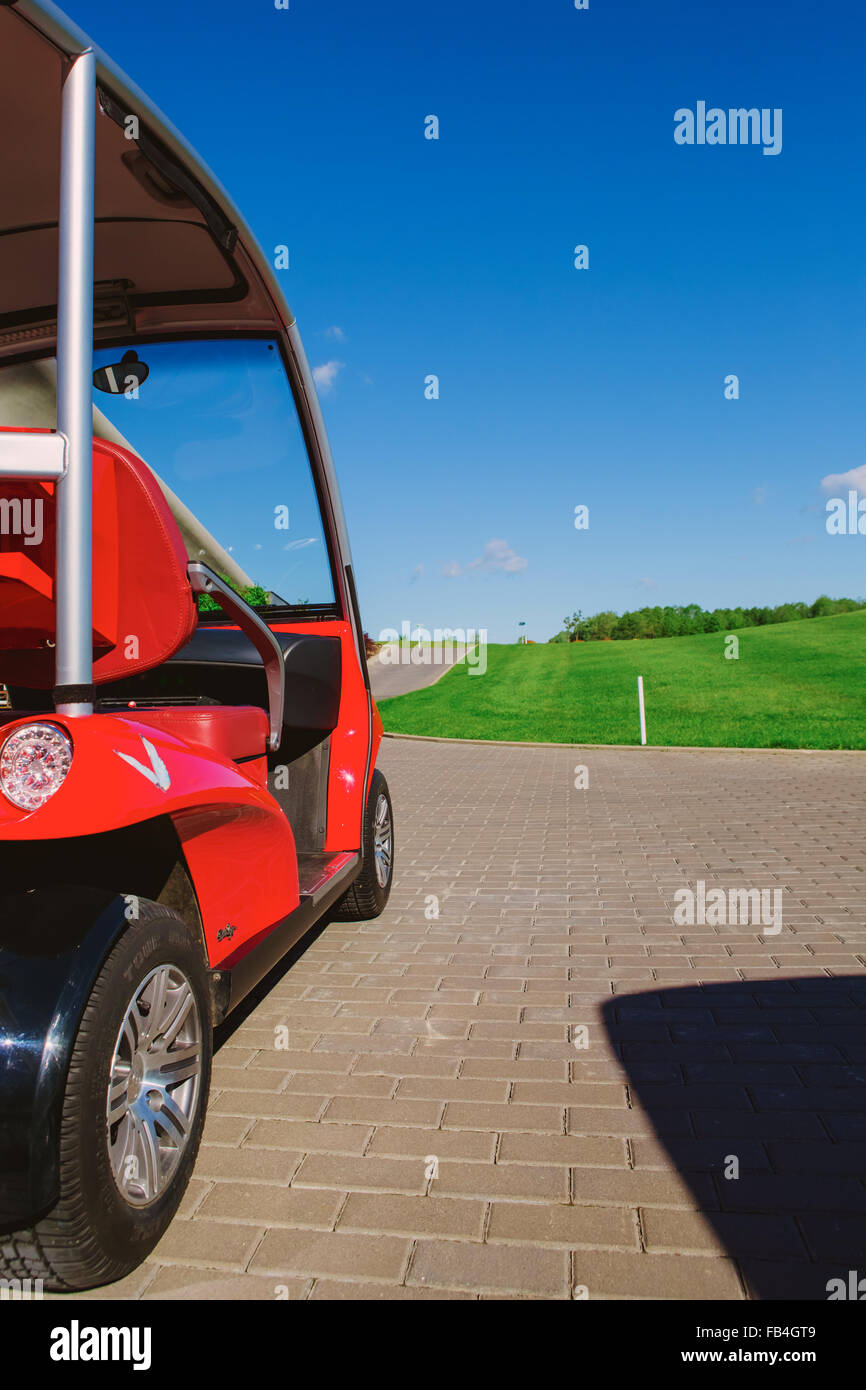 Golf car on the golf course at summer day Stock Photo - Alamy