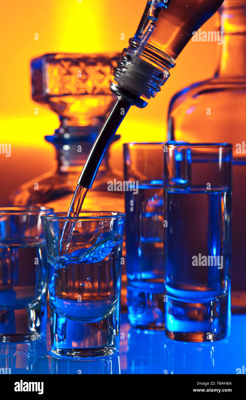 vodka in bar on a glass table Stock Photo - Alamy