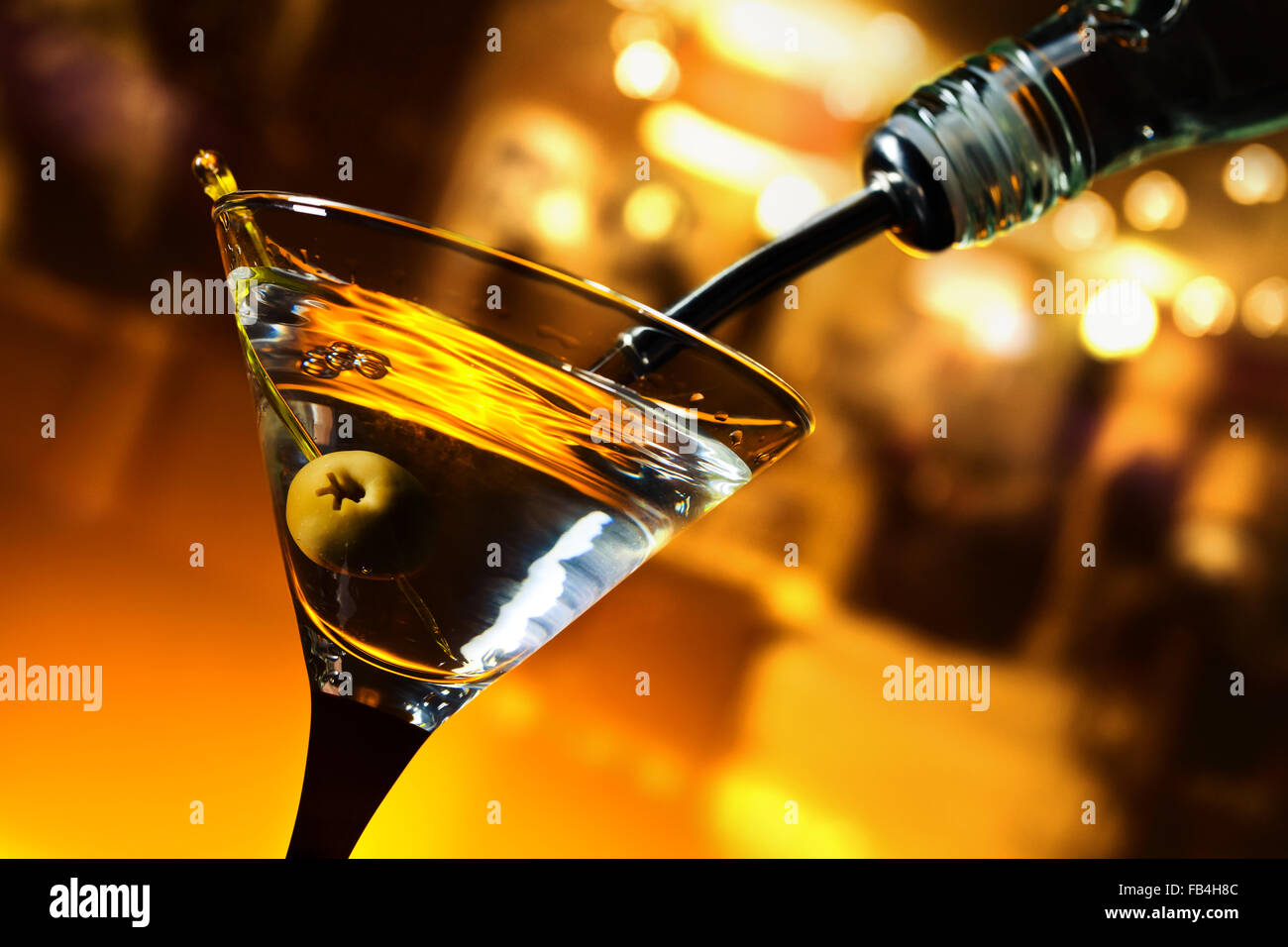 Martini with green olive hi-res stock photography and images - Alamy
