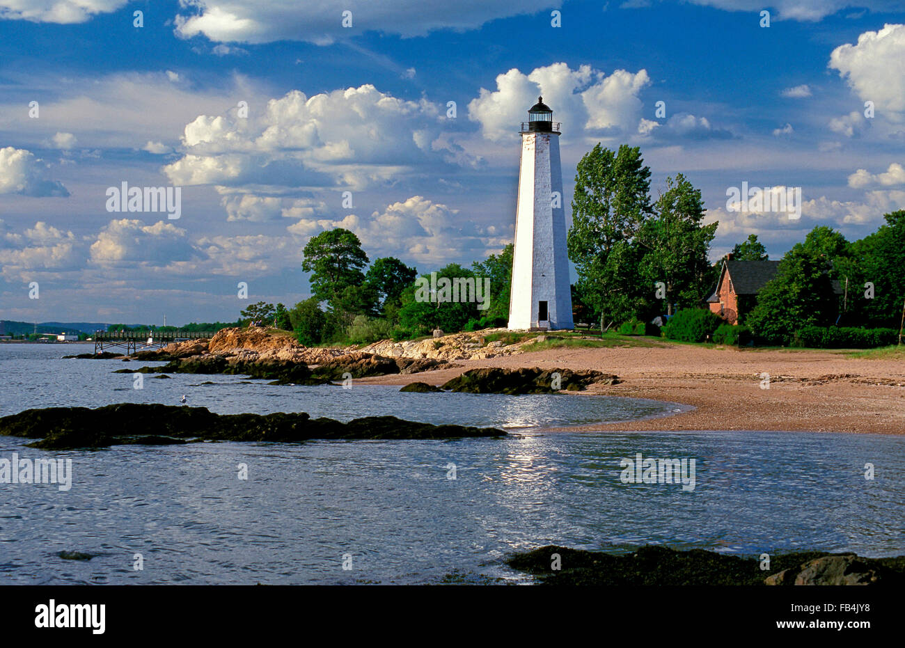 Sun illuminates tower of Five Mile Point lighthouse inside Lighthouse ...