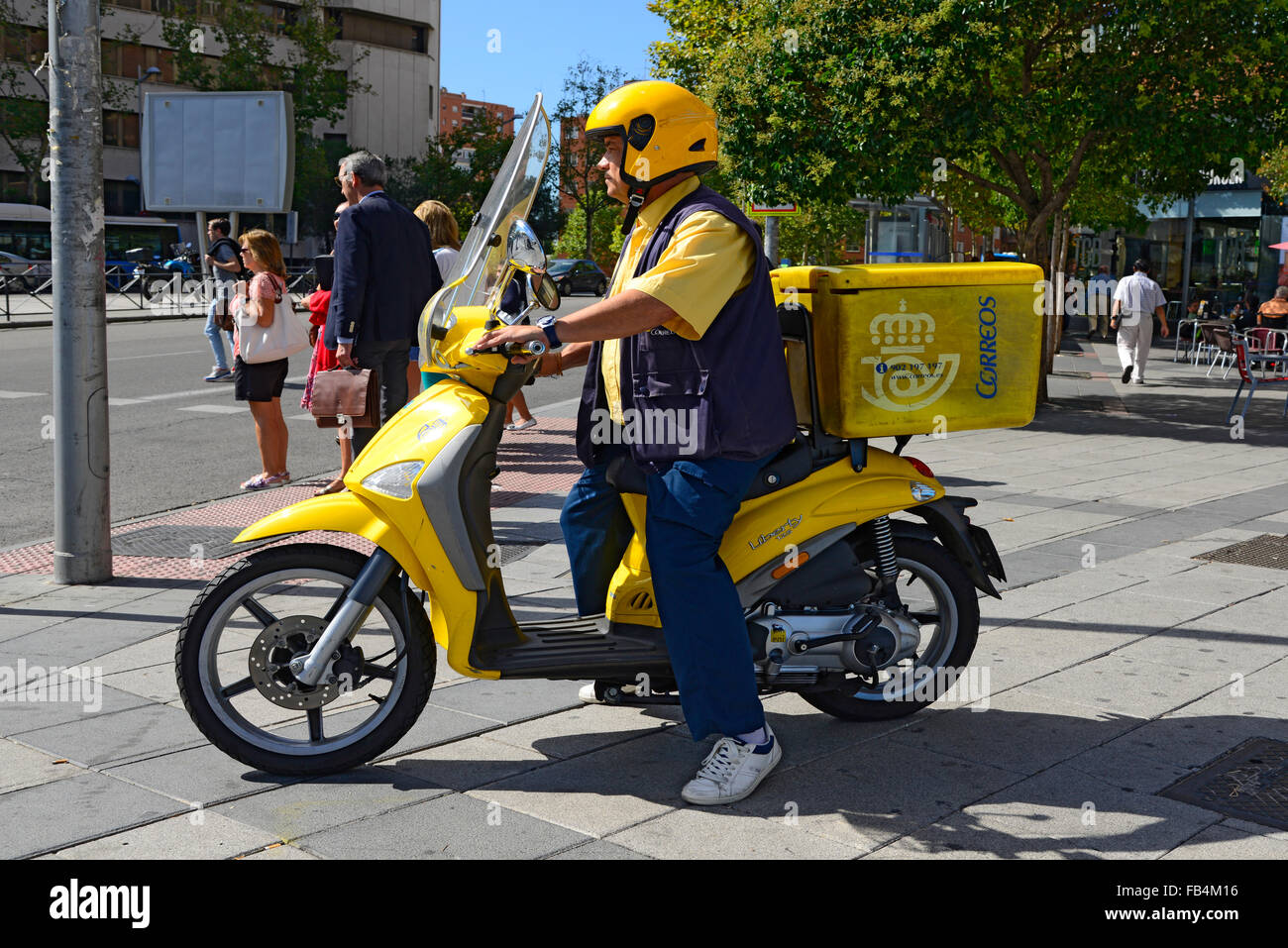 Correos Mail Carrier on Motorcycle Madrid Spain ES Stock Photo - Alamy