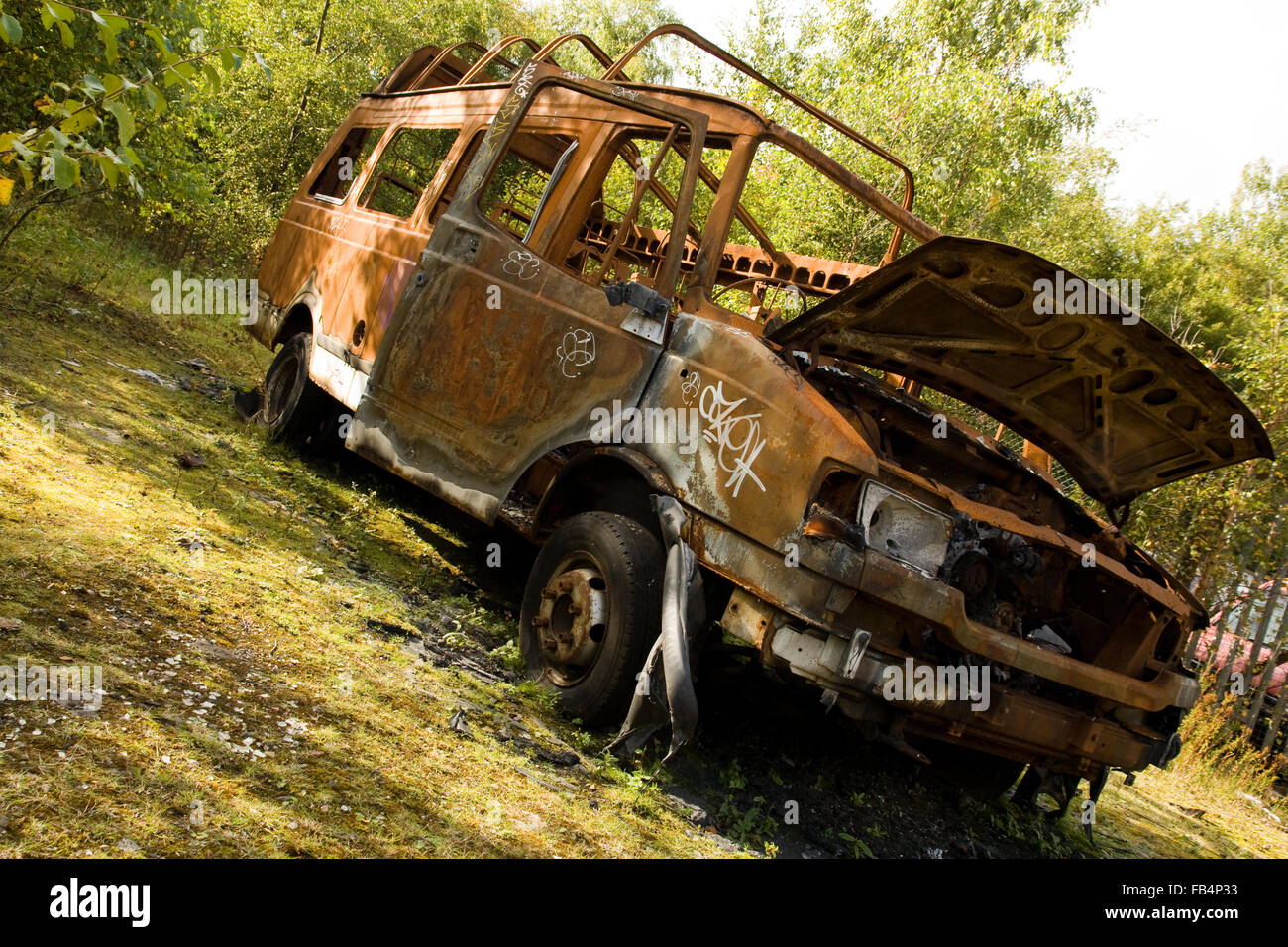 burned out and abandoned rusted van Stock Photo - Alamy