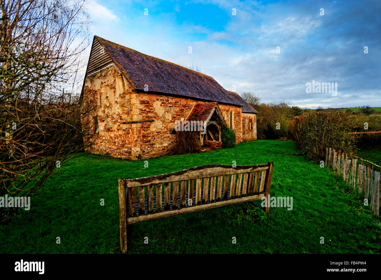 Sapey Old Church is located at the end of a lane beside the river Sapey ...