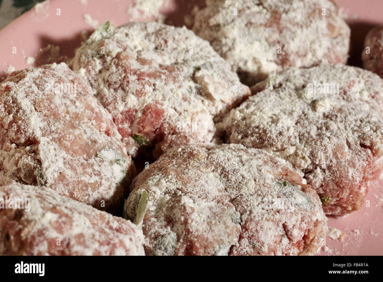Polpette, Italian style meatballs ready to be cooked Stock Photo - Alamy