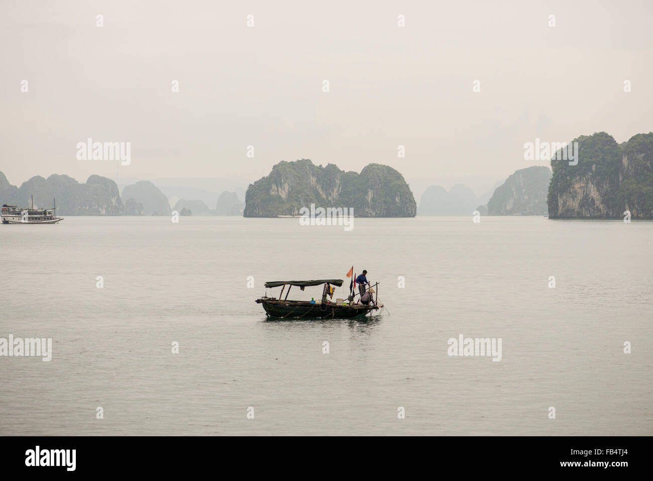 Halong Bay fishing boat, Vietnam Stock Photo - Alamy