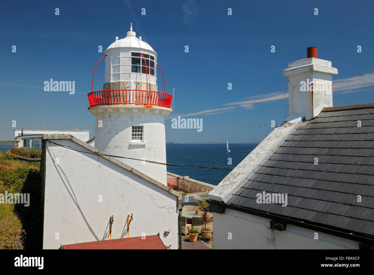 lighthouse at the Crookhaven Bay on Mizen peninsula, County Cork ...