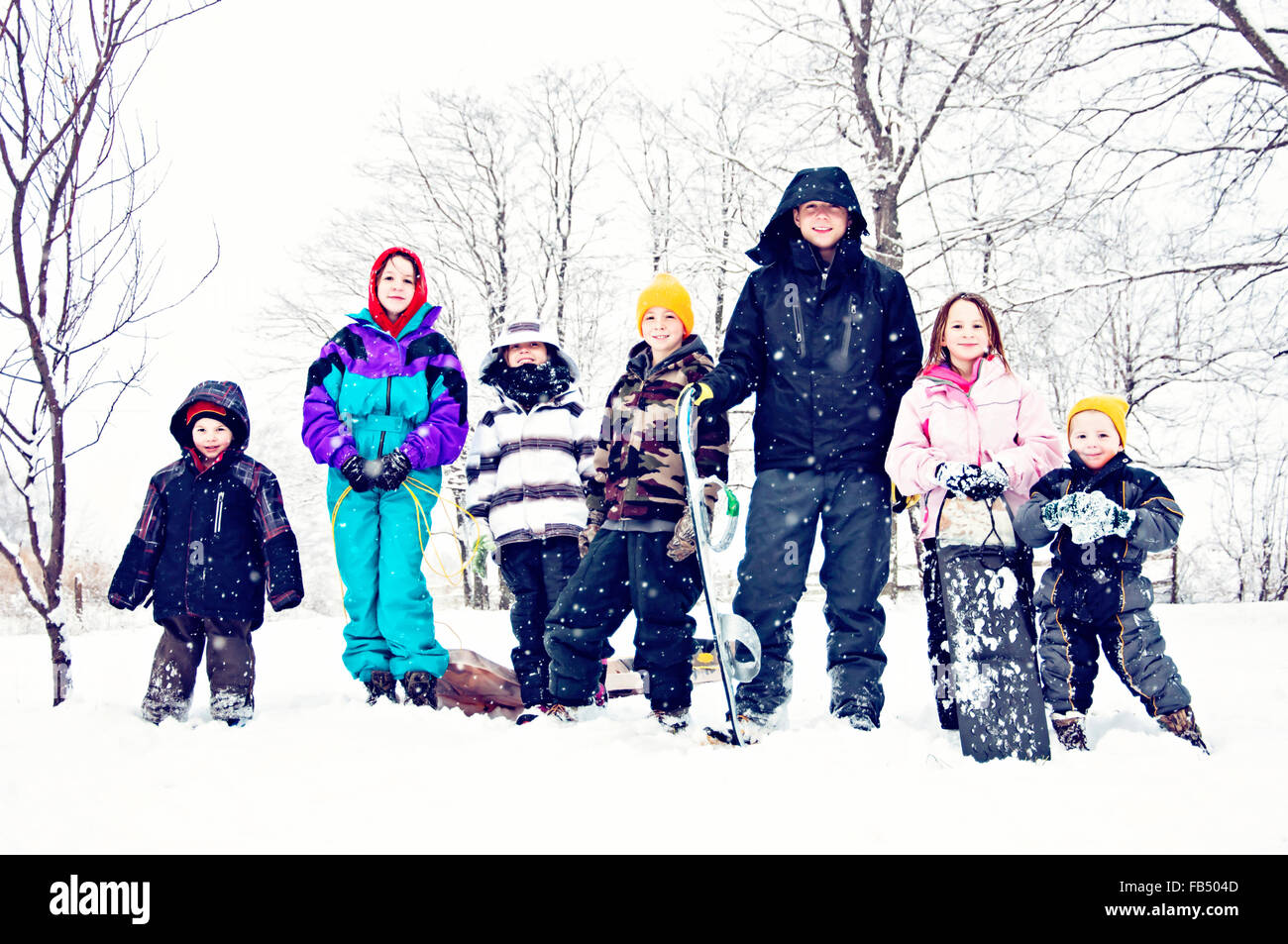 Seven Country kids snow day Stock Photo - Alamy